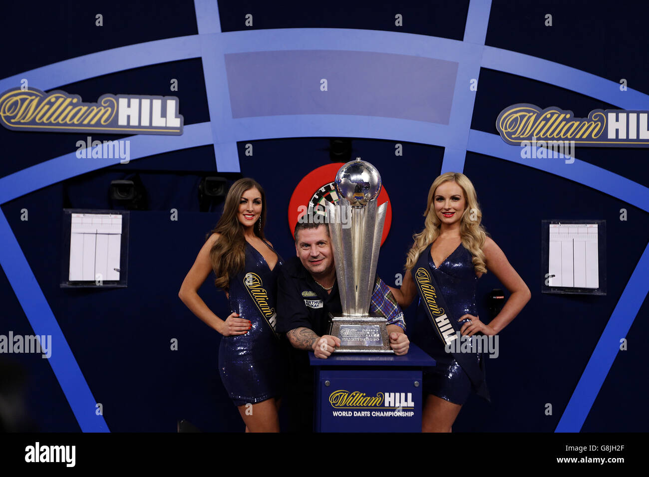 Gary Anderson celebrates with the Sid Waddell trophy after winning the ...