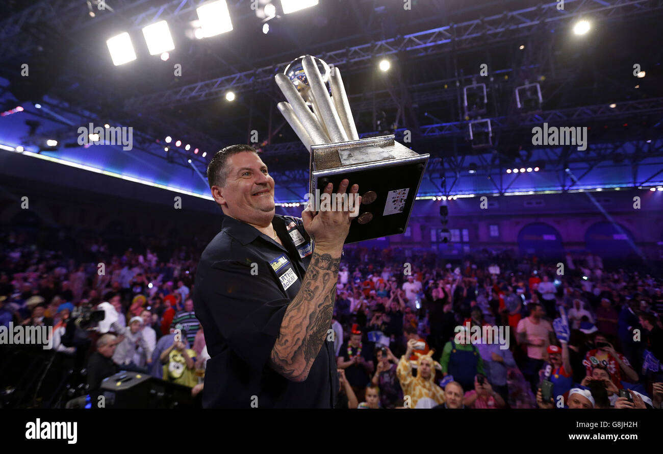 Gary Anderson celebrates with the Sid Waddell trophy after winning the ...