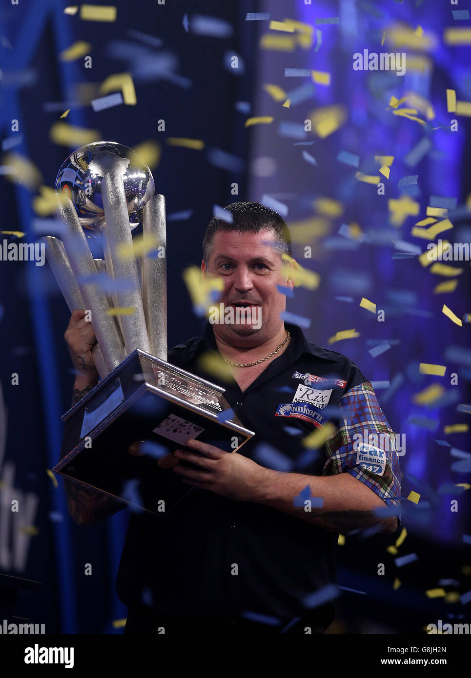 Gary Anderson celebrates with the Sid Waddell trophy after winning the ...