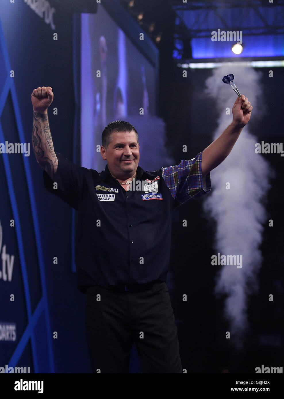 Gary Anderson celebrates winning the final during the final during day ...