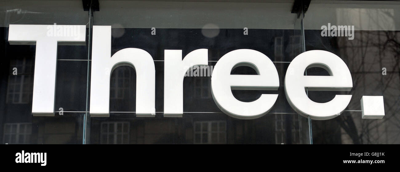 Shop sign stock. A shop sign for Three mobile in central London Stock ...