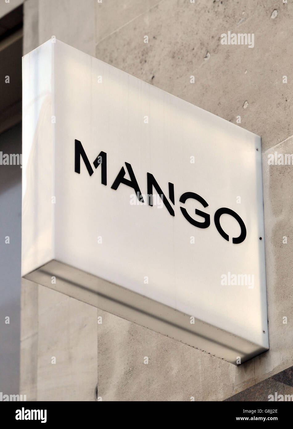 Shop sign stock. A shop sign for MANGO in central London Stock Photo ...