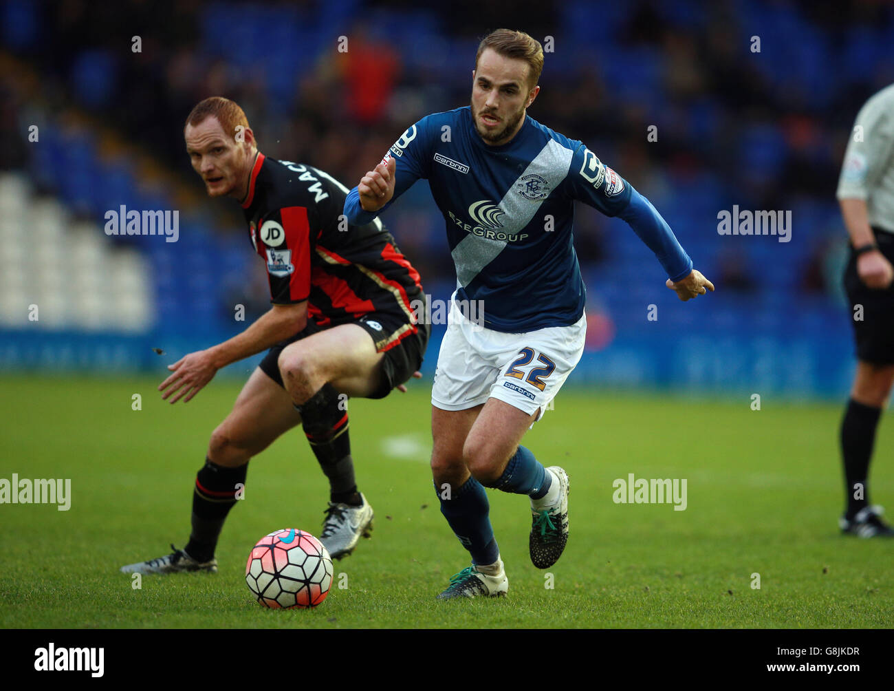 Birmingham City's Andrew Shinnie gets away from Bournemouth's Shaun ...