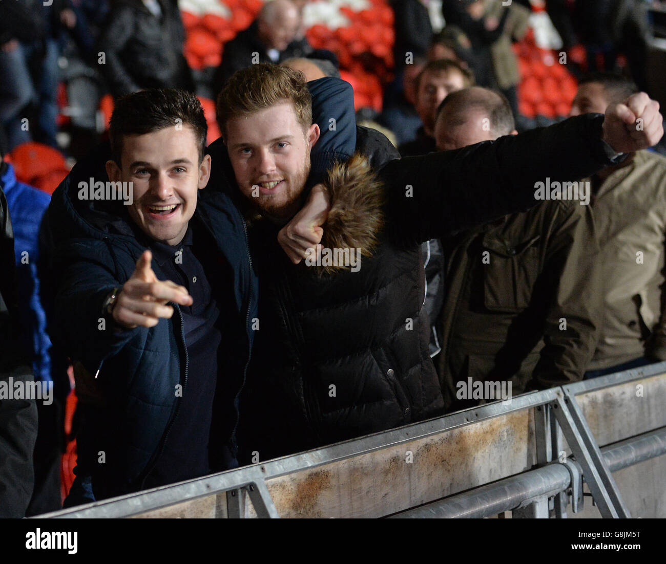 Stoke city fans in the stands at the keepmoat stadium hi-res stock ...