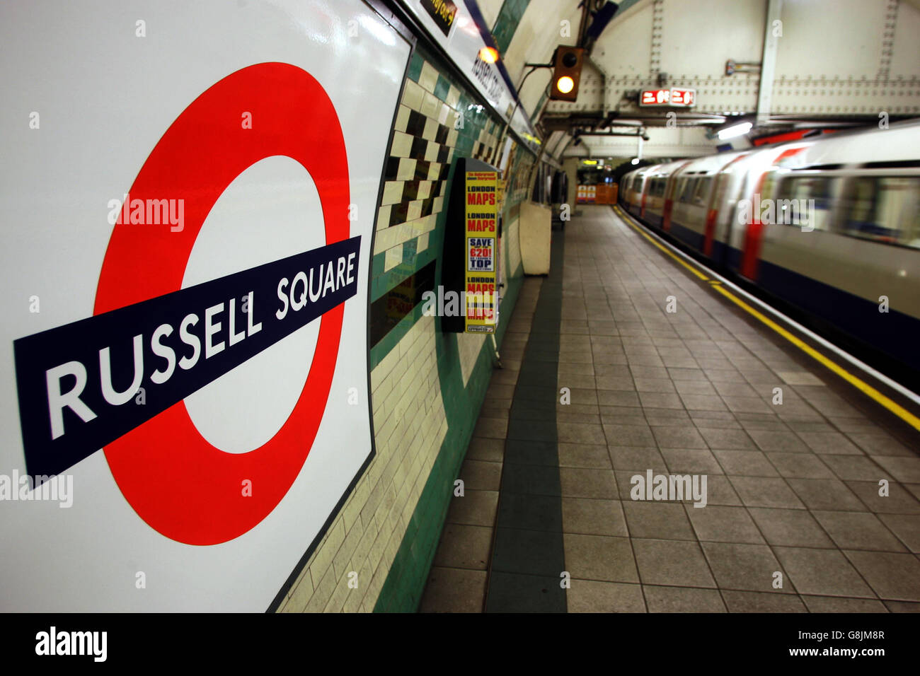 An Underground train passes through Russell Square station after it ...
