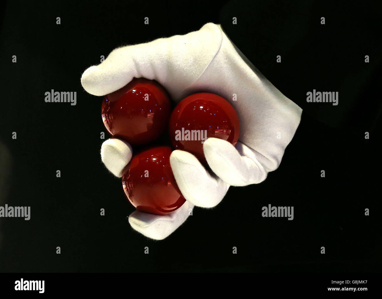 A view of the referee holding snooker red balls during the Dafabet ...