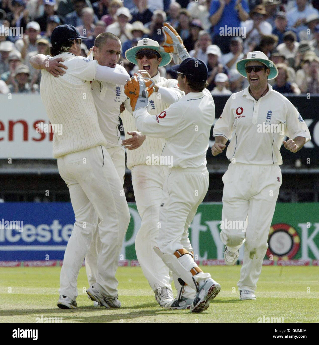 England bowler simon jones is hugged by kevin pietersen l hi-res stock ...