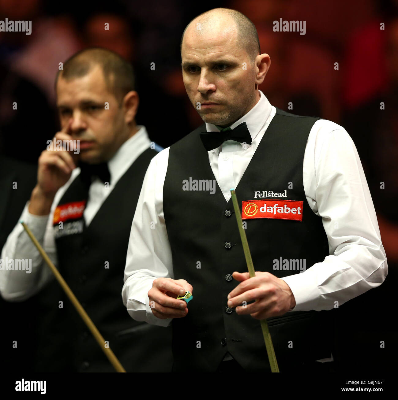 Joe Perry (right) and Barry Hawkins (left) during the Dafabet Masters ...