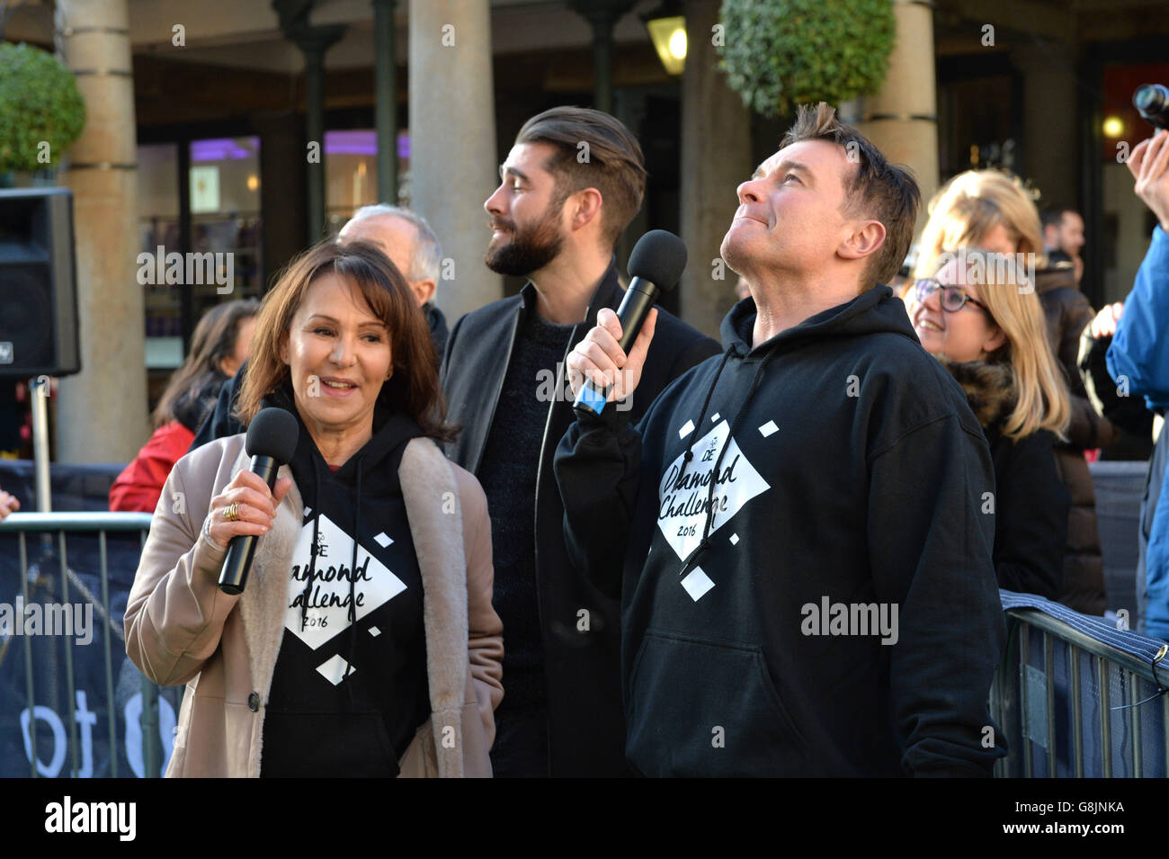Arlene phillips greg burns climbing wall in covent garden hi-res stock ...
