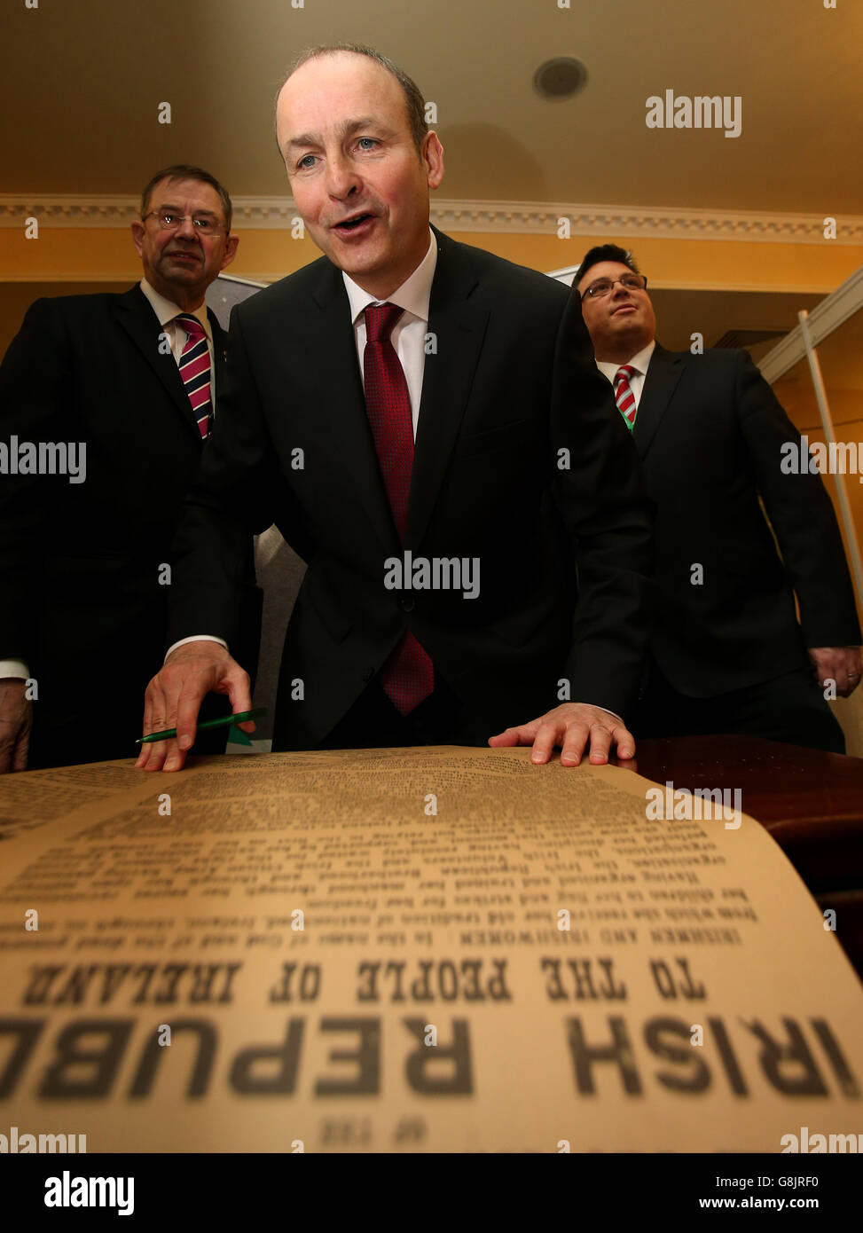 Fianna Fail leader Micheal Martin signs a replica of the 1916 ...