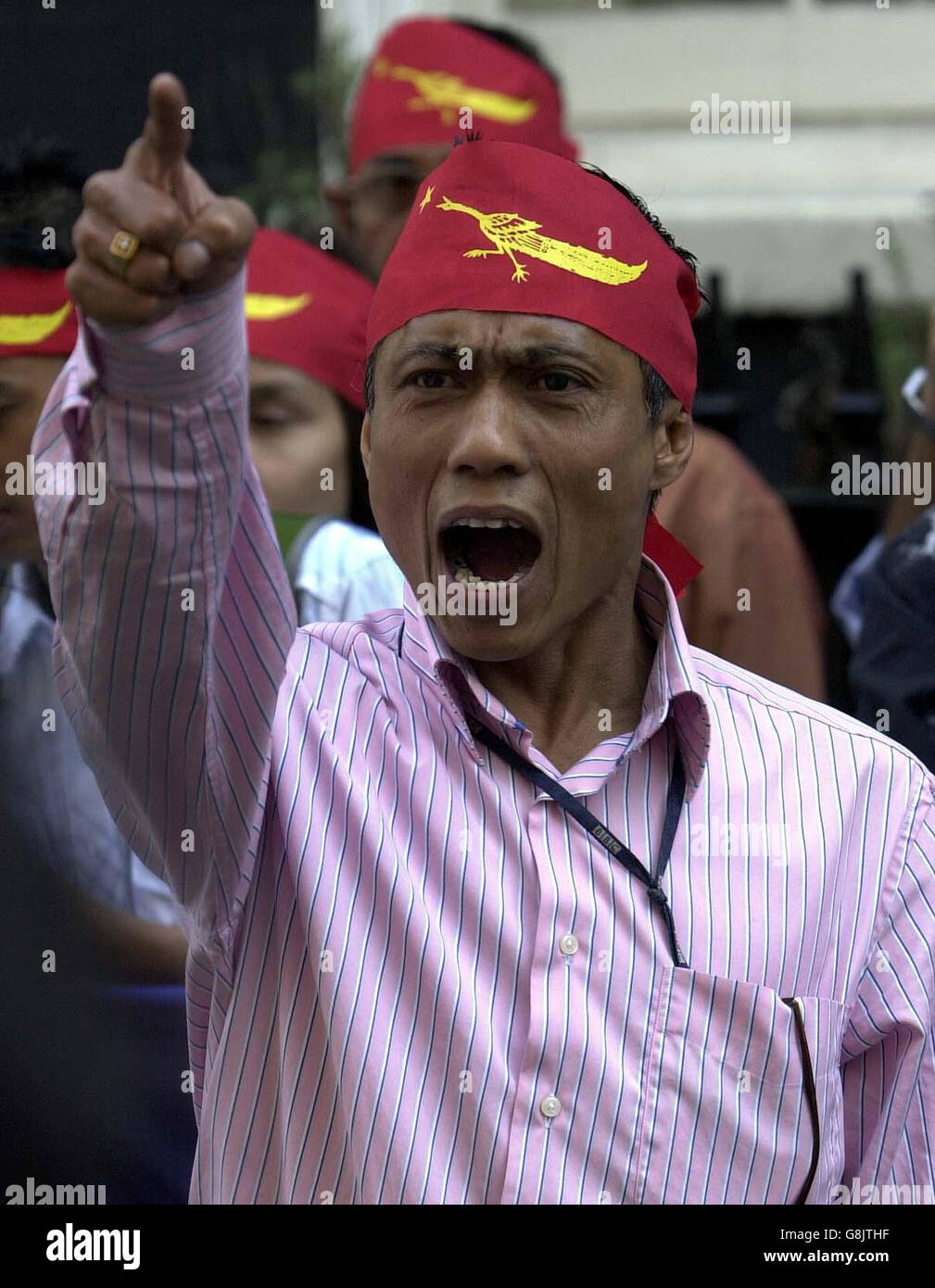 Ko Aung, of the Burmese Democratic Movement Association, demonstrates ...
