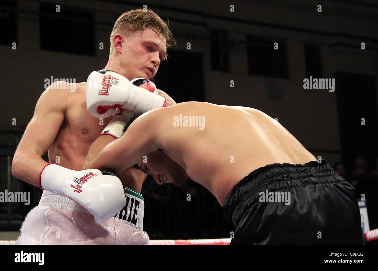 Archie Sharp (left) and Qasim Hussain during their lightweight contest ...