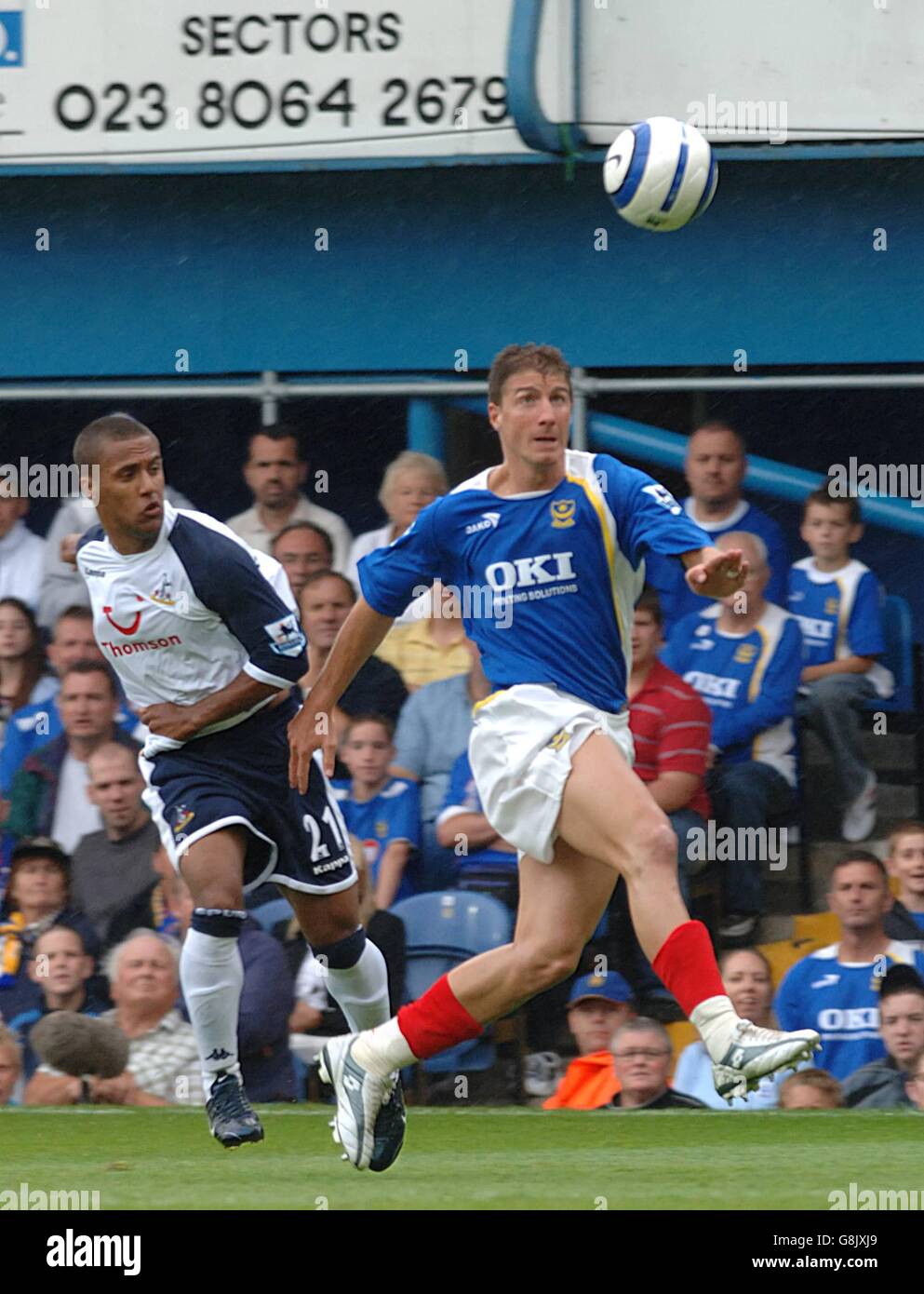 Wayne Routledge, Tottenham Hotspur (L) and Matthew Taylor, Portsmouth ...