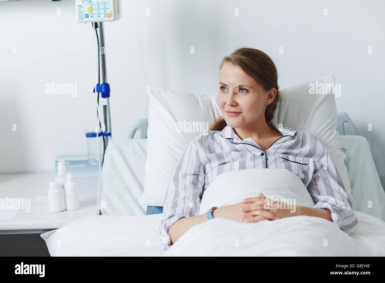 Patient in bed Stock Photo - Alamy