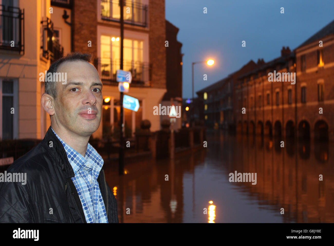 Chris Wardle, 46, stands near his first-floor flat on Skeldergate, a ...