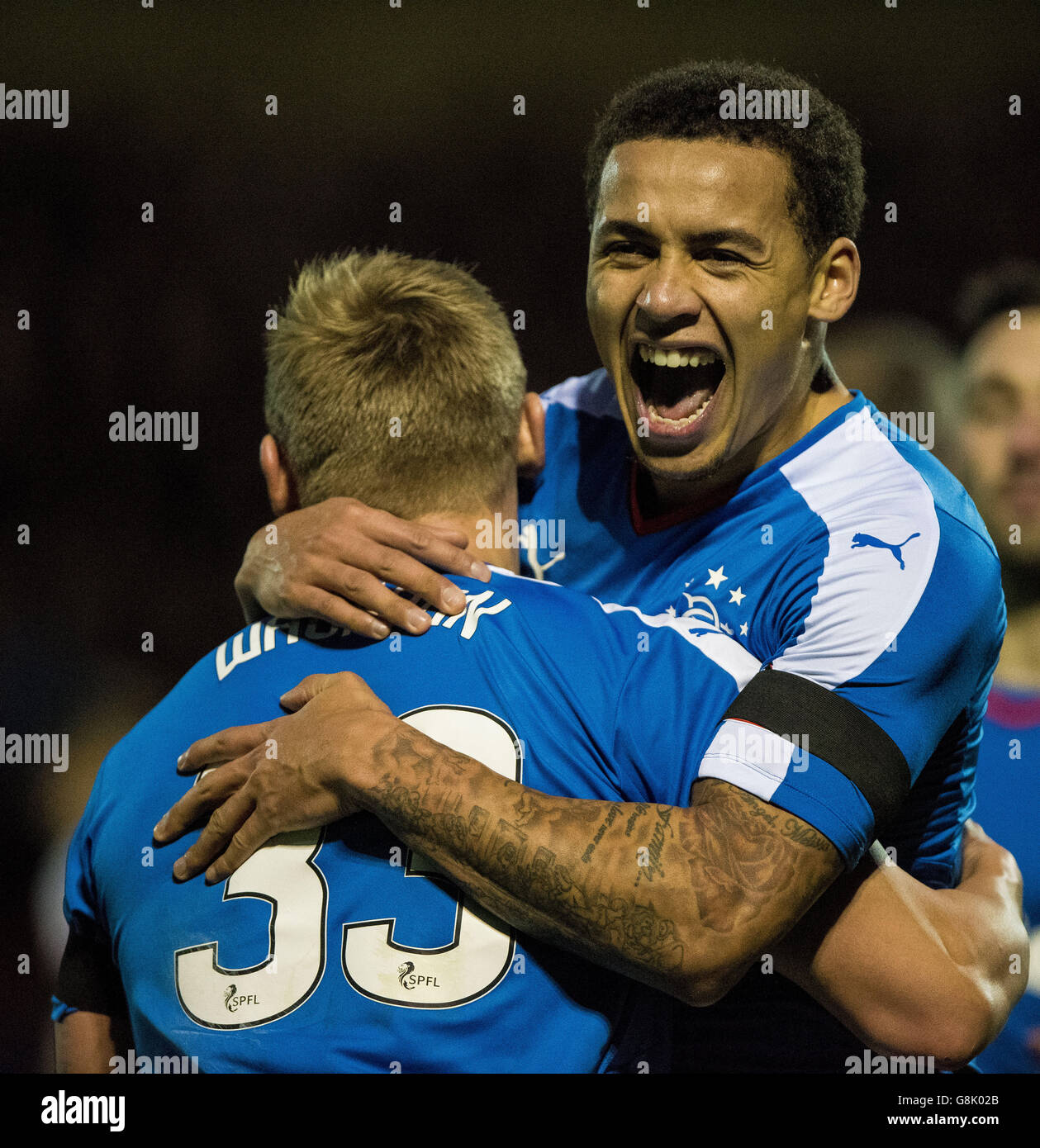 Rangers' Martin Waghorn (left) celebrates scoring his sides fourth goal ...