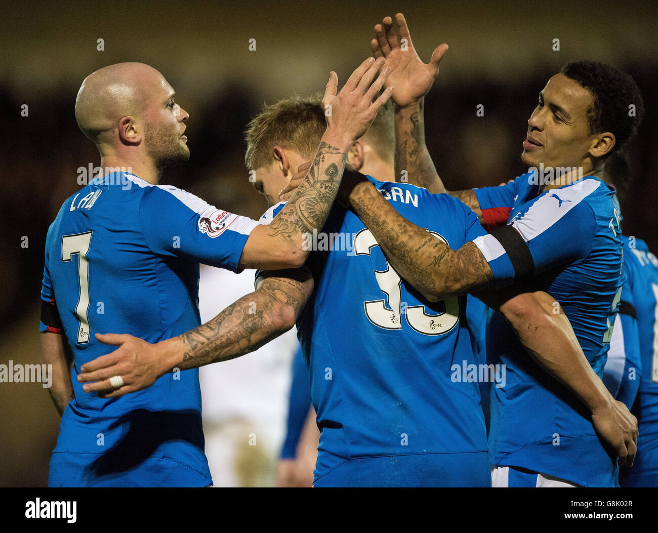 Rangers' Martin Waghorn (centre) celebrates scoring his sides fourth ...