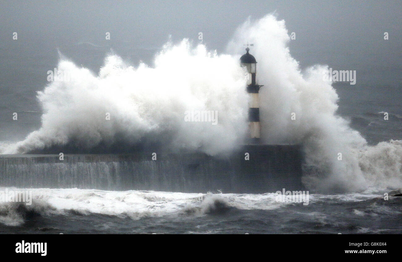 Huge waves hit seaham lighthouse in durham hi-res stock photography and ...