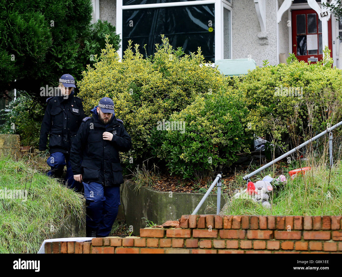 Police search officers remain at the house in Erith, Kent, which is ...