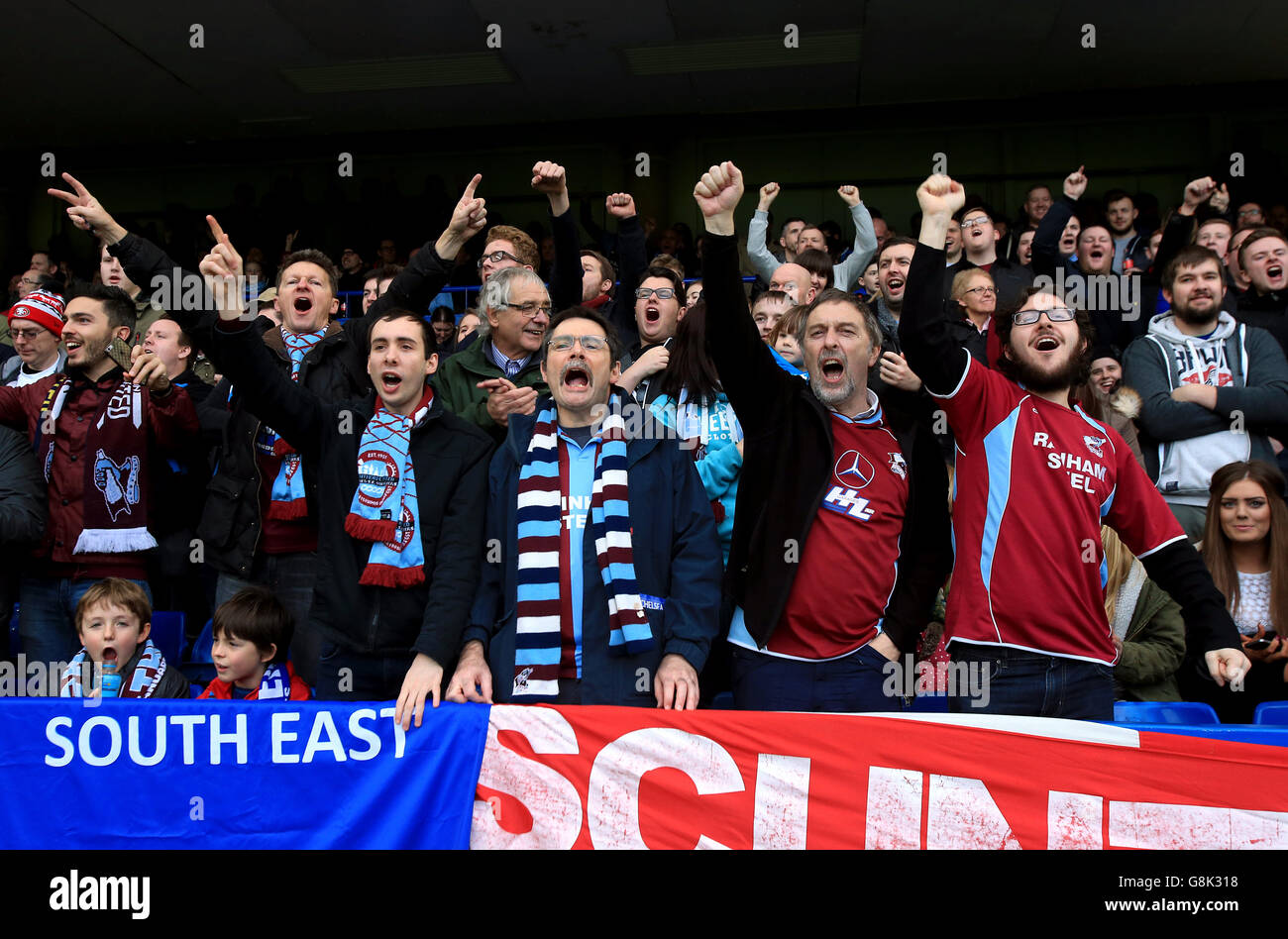 Scunthorpe United fans show their support in the stands before the ...