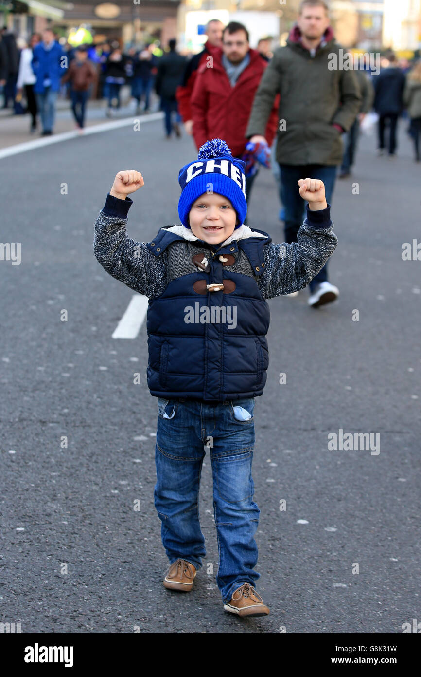 A young Chelsea fan shows his support outside the ground, before the ...