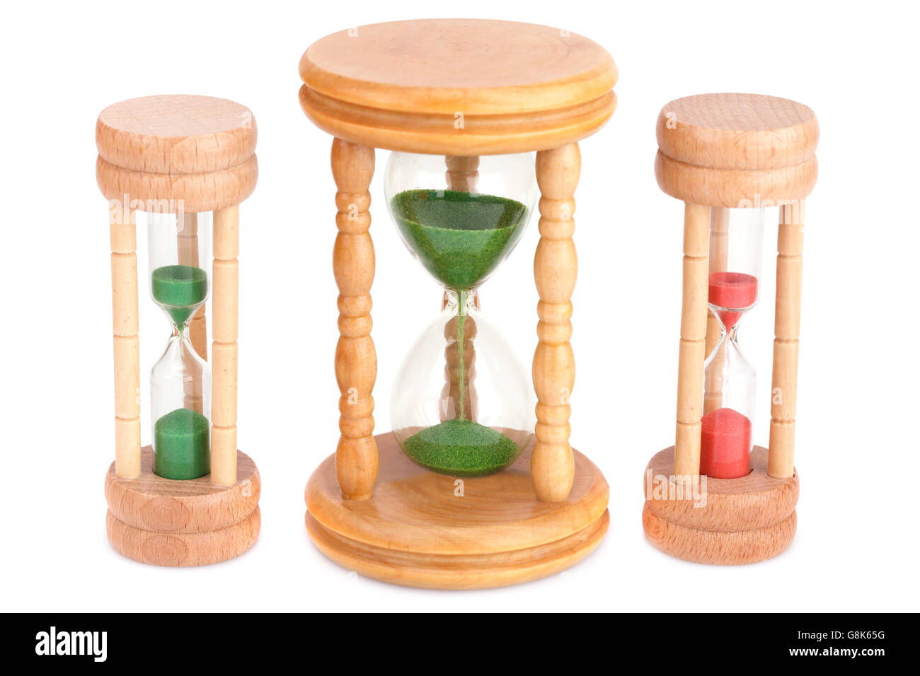 Three hourglasses isolated on white background Stock Photo - Alamy