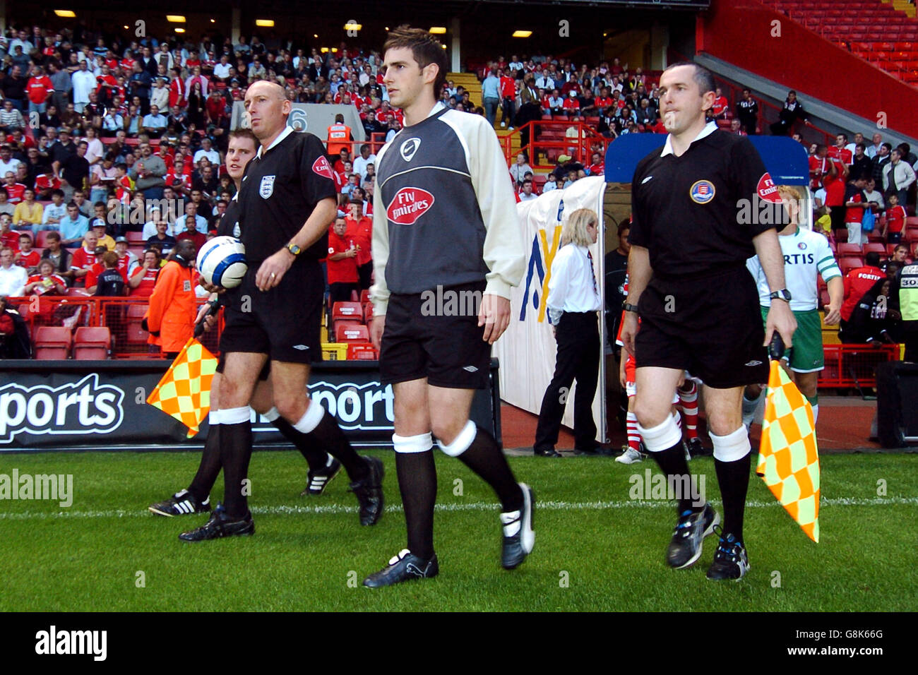Referee Barry Knight, fourth official Steve Cook (c) and assistant ...