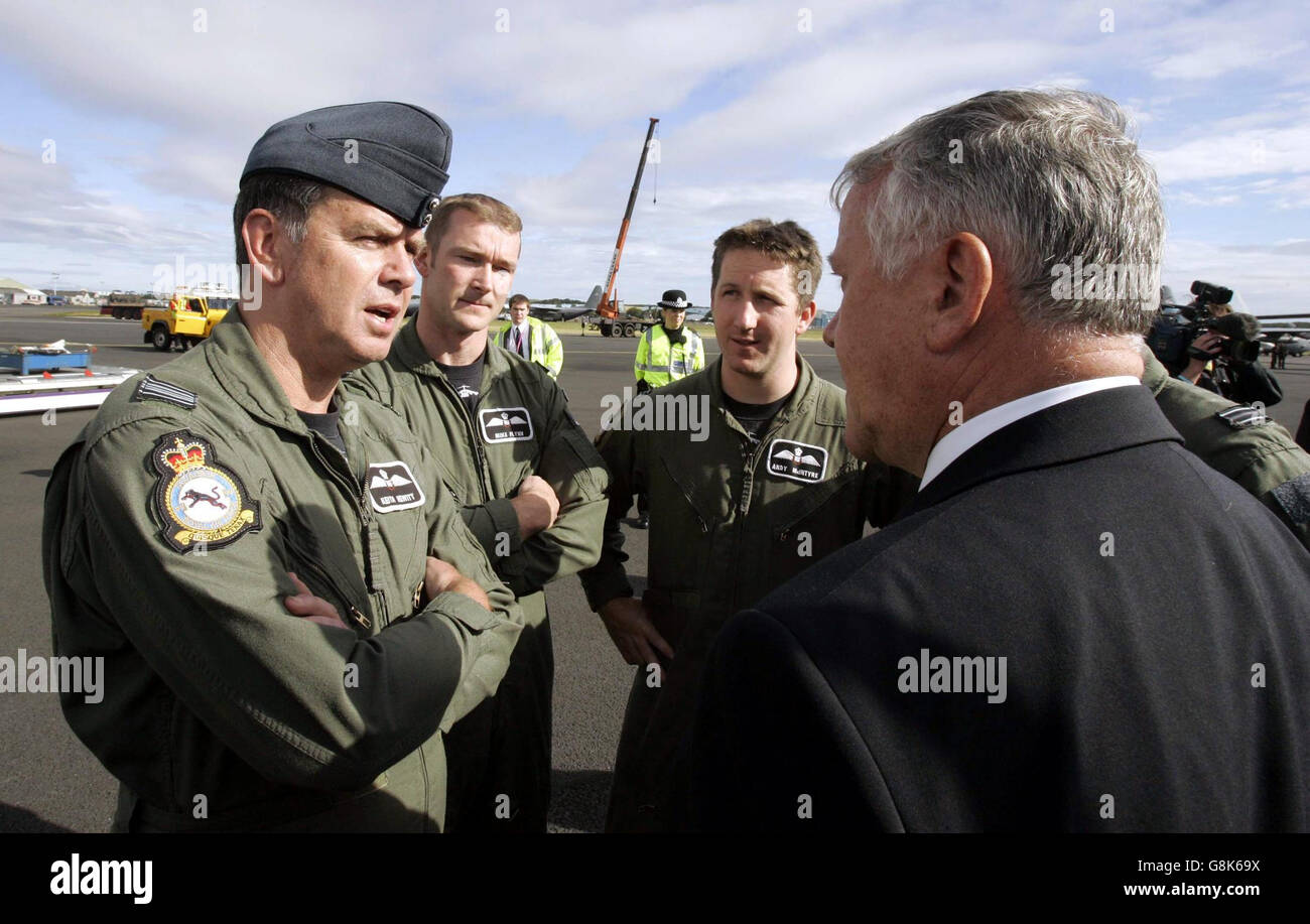 RAF Squadron leader Keith Hewitt (left) with Armed forces minister Adam ...