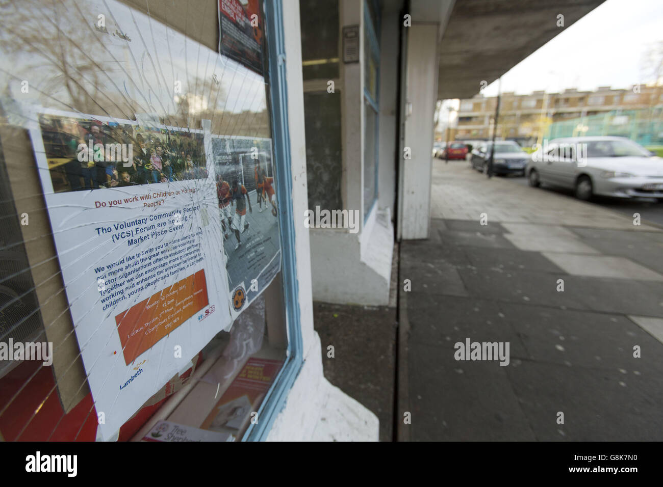 Signs and notices in the window of the Angell Delight Community Project ...