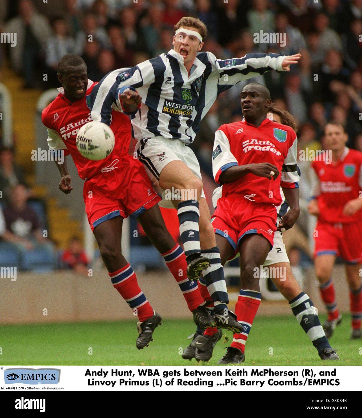 Group full red stripes front view action tackle football hi-res stock ...