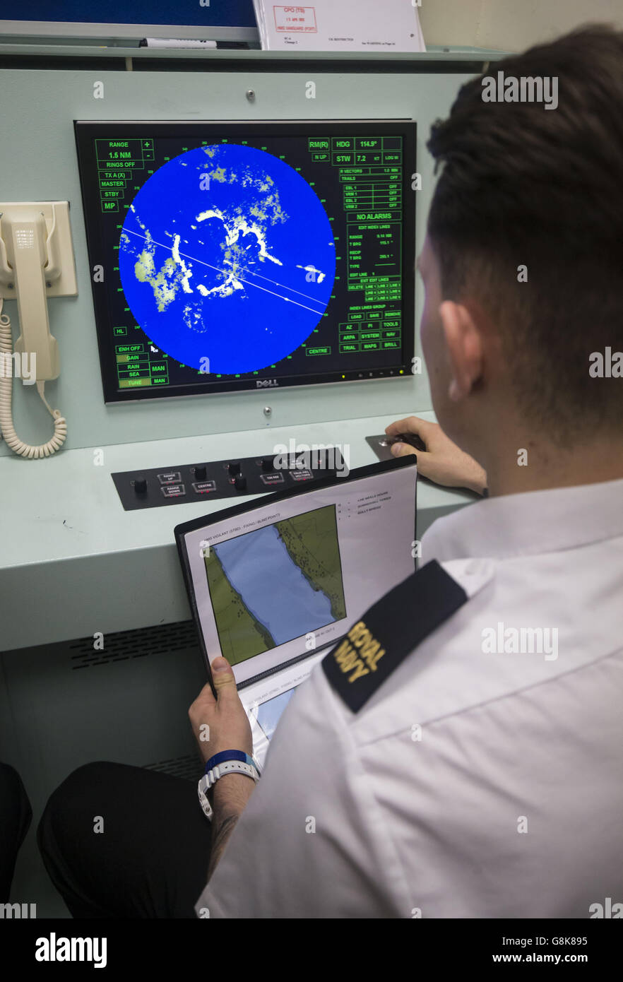 A member of the Royal Navy at a training facility for submarine ...