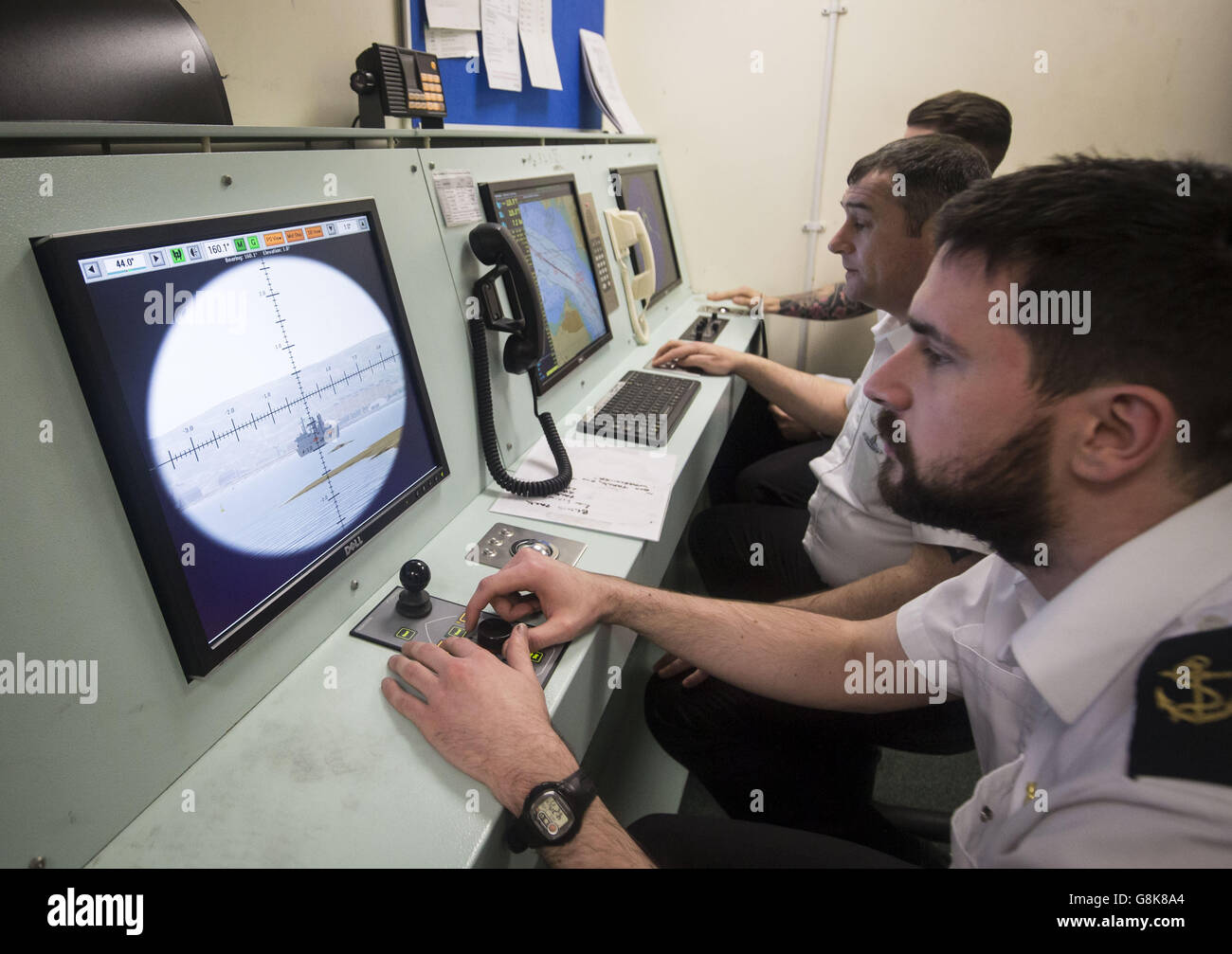 Members of the Royal Navy at a training facility for submarine ...