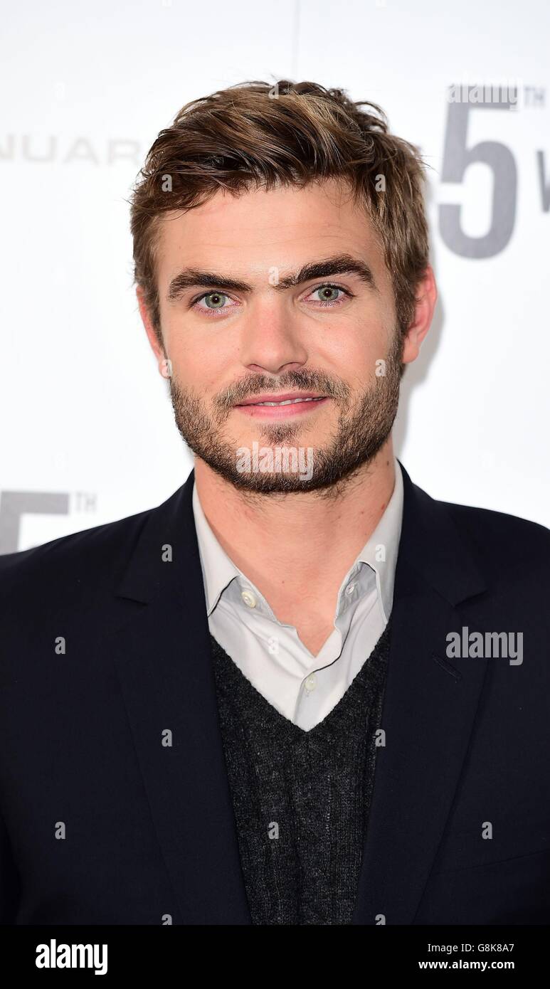 Alex Roe attends a photo call for new sci-fi film The Fifth Wave at the ...