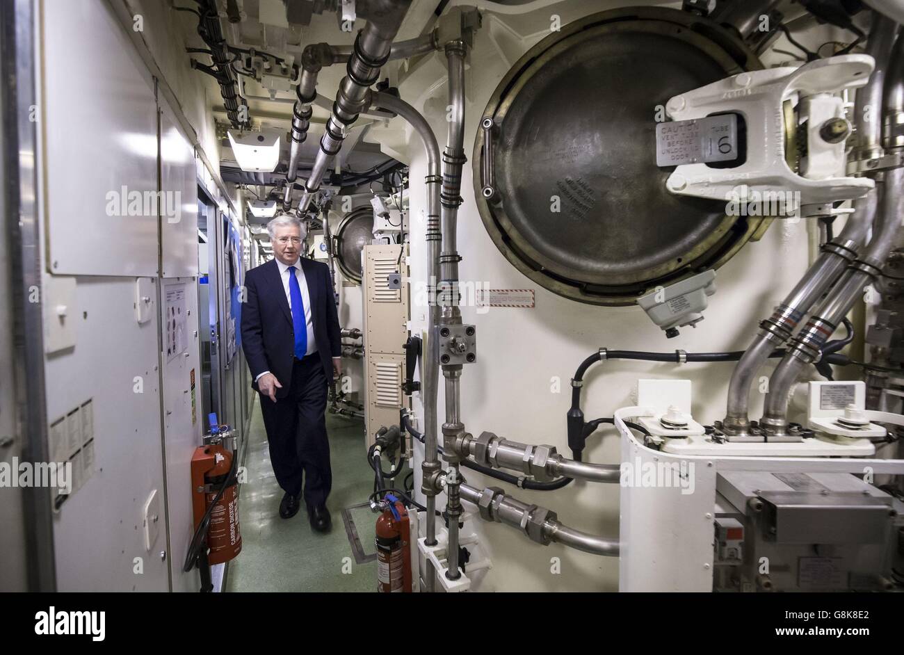 Defence Secretary Michael Fallon in the missiles compartment that can ...