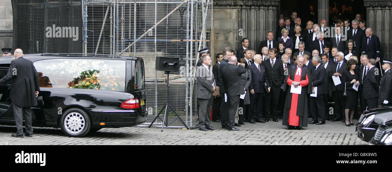 The coffin leaves St Giles Cathedral, following the funeral of Robin ...