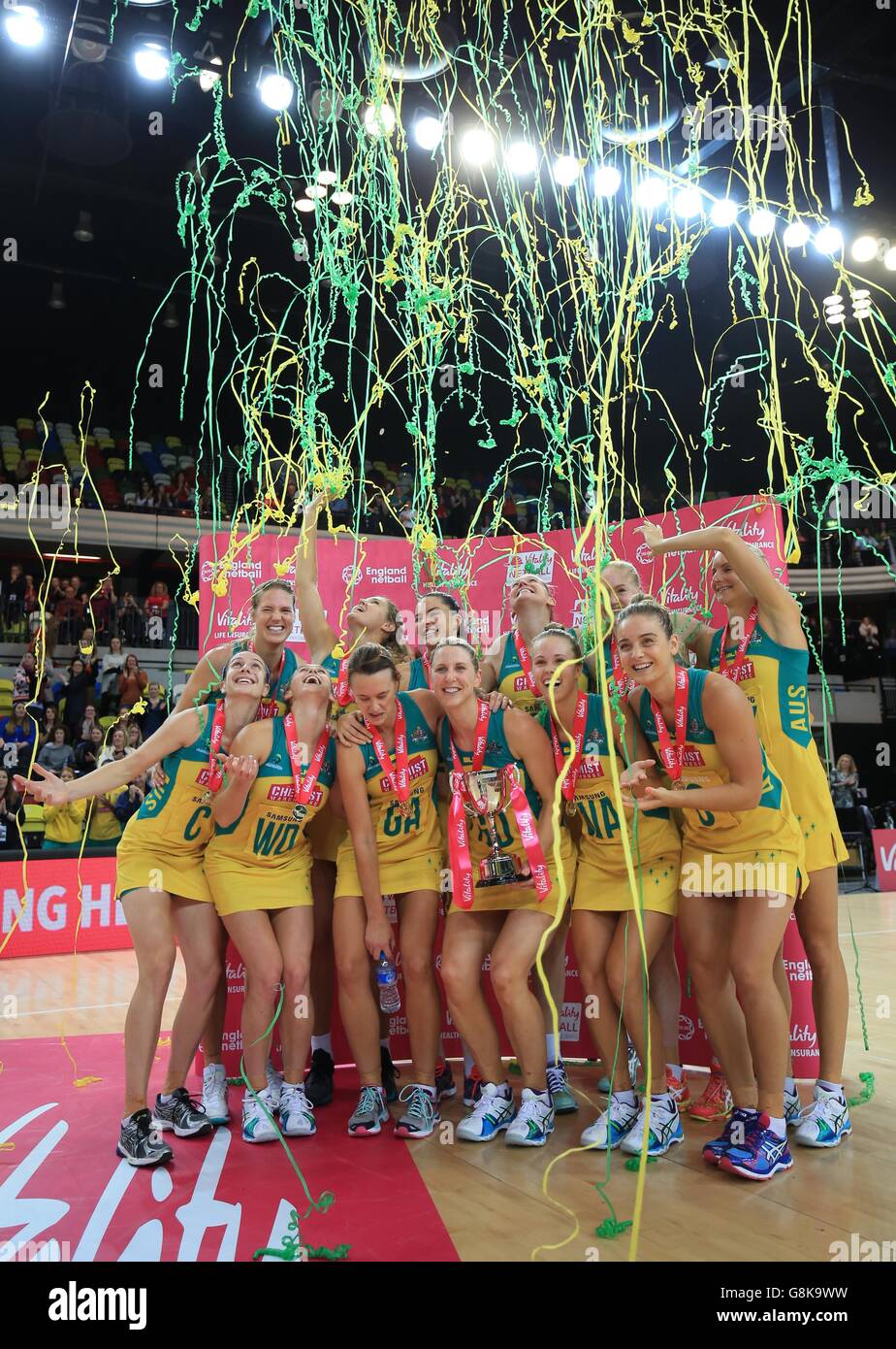 Australia captain Clare McMeniman (centre) celebrates with the trophy ...