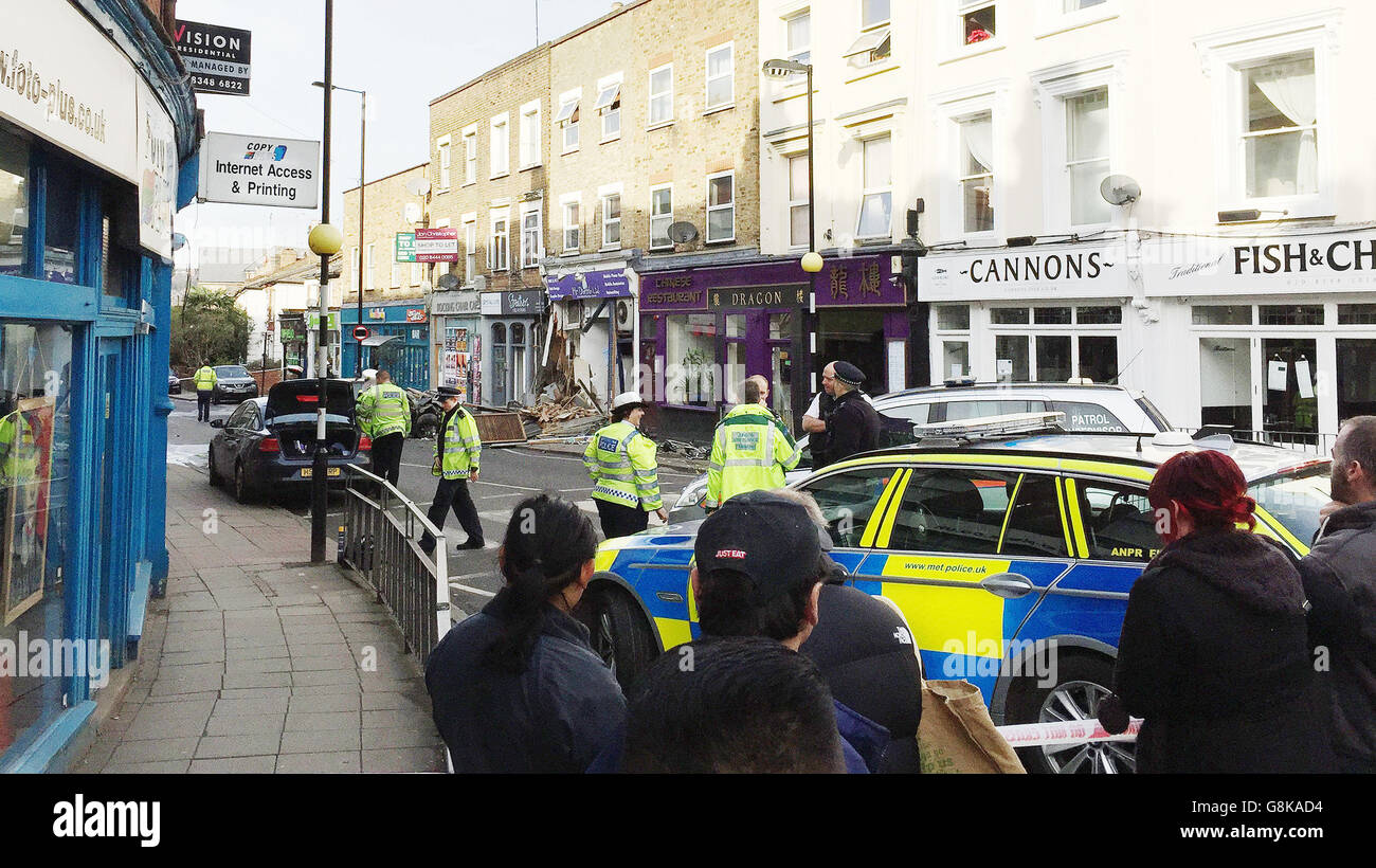 Emergency services at the scene where a car crashed into a shop on Park ...