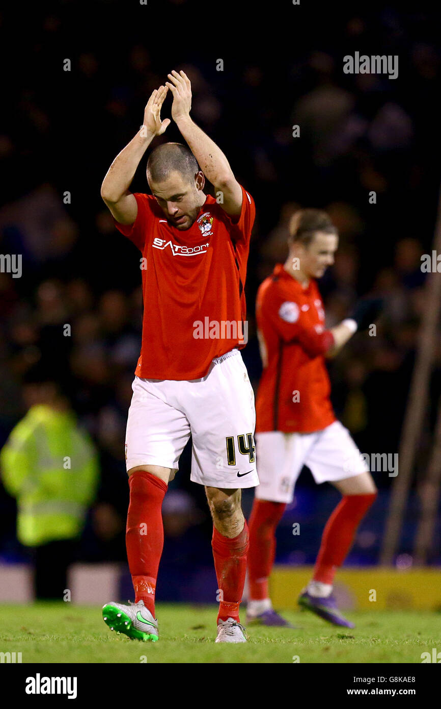 Coventry City's Joe Cole appears dejected as he applauds the traveling ...