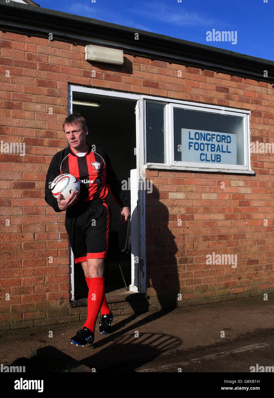 Former England defender Stuart Pearce is unveiled coming out of ...