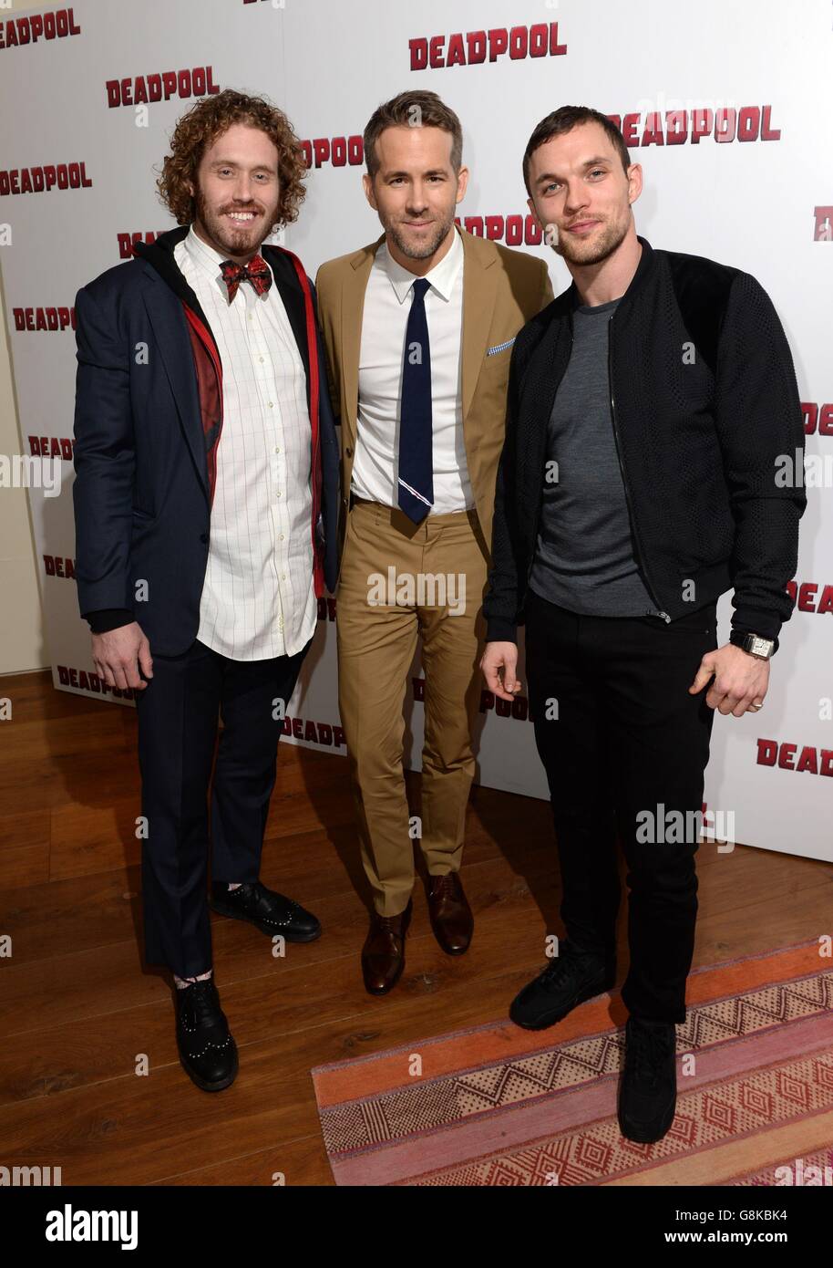 (left to right) TJ Miller, Ryan Reynolds and Ed Skrein attending a ... (left to right) TJ Miller, Ryan Reynolds and Ed Skrein attending a ...