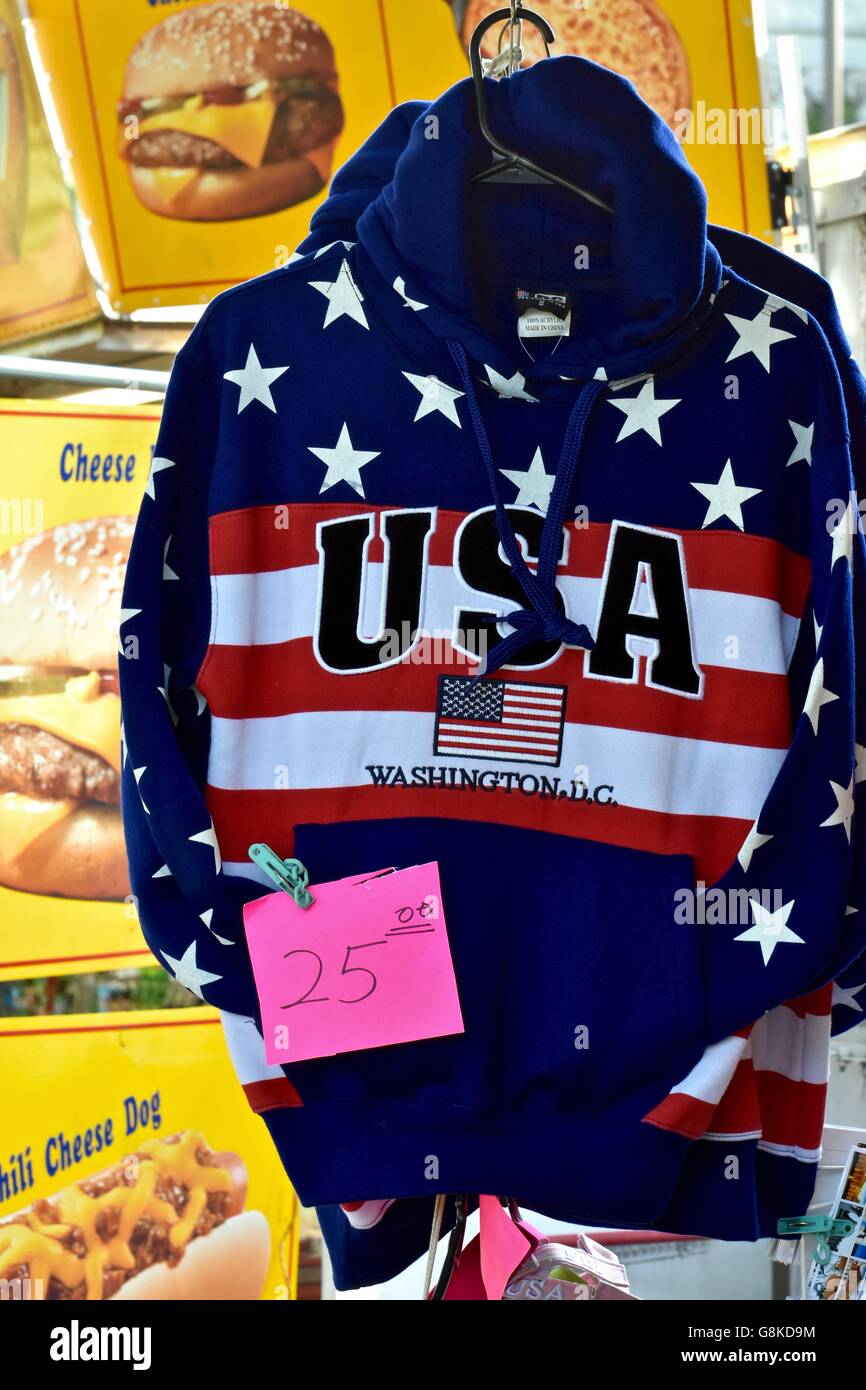 A small shop on the street selling clothing and other souvenirs of ...