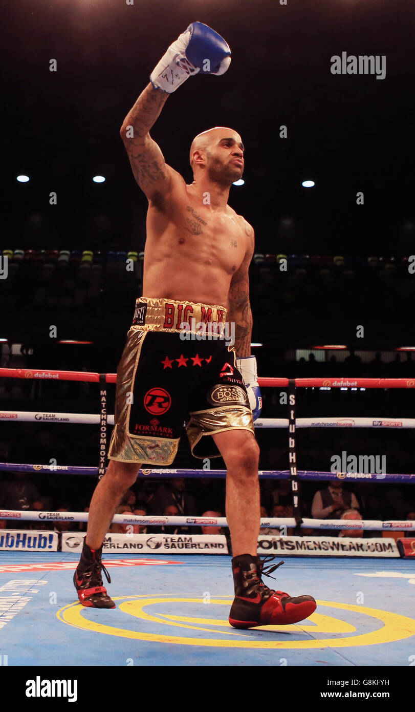 Leon McKenzie celebrates beating Kelvin Young (not pictured) in their ...
