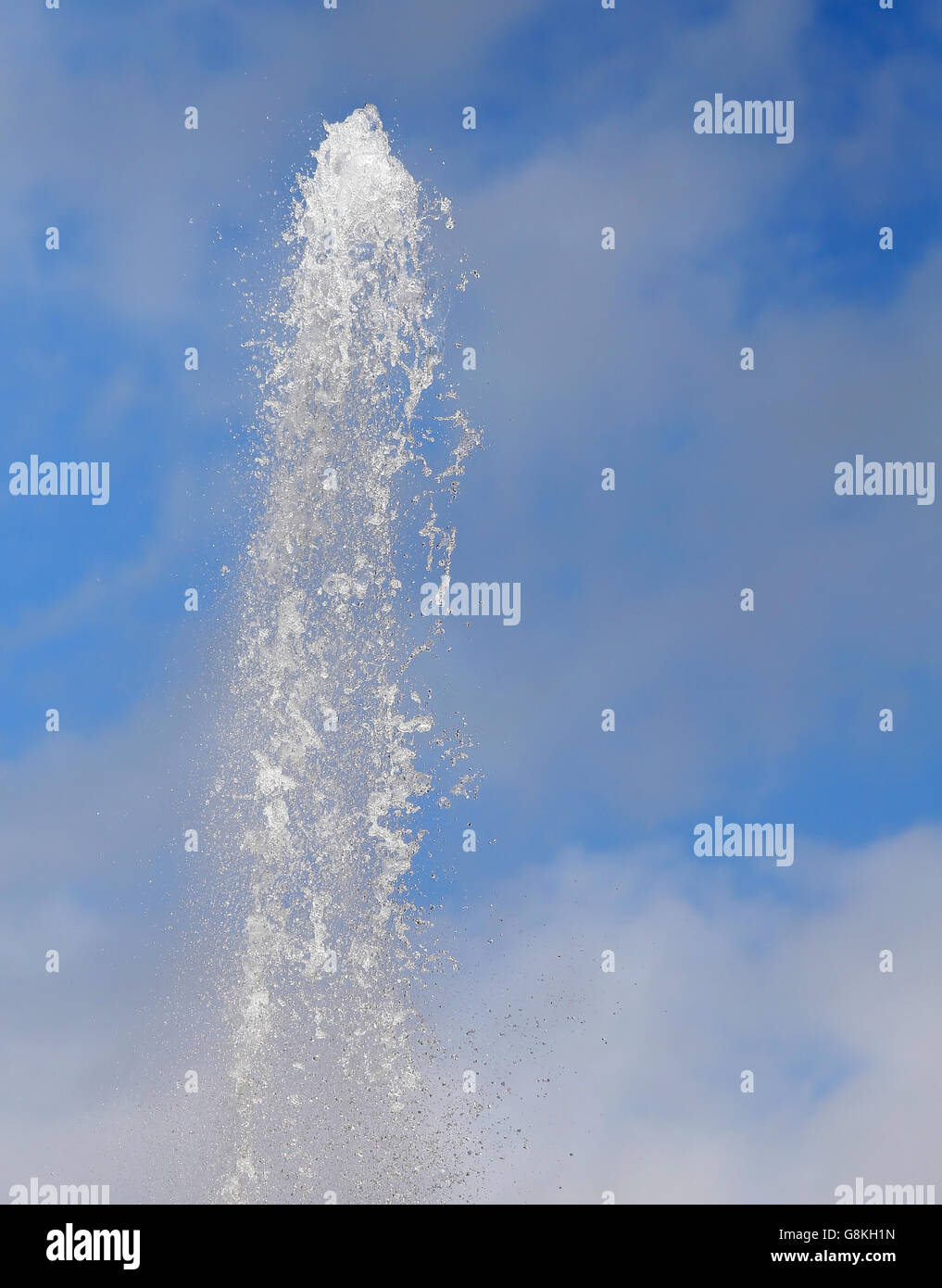 water jet in the background of the blue sky with clouds Stock Photo - Alamy