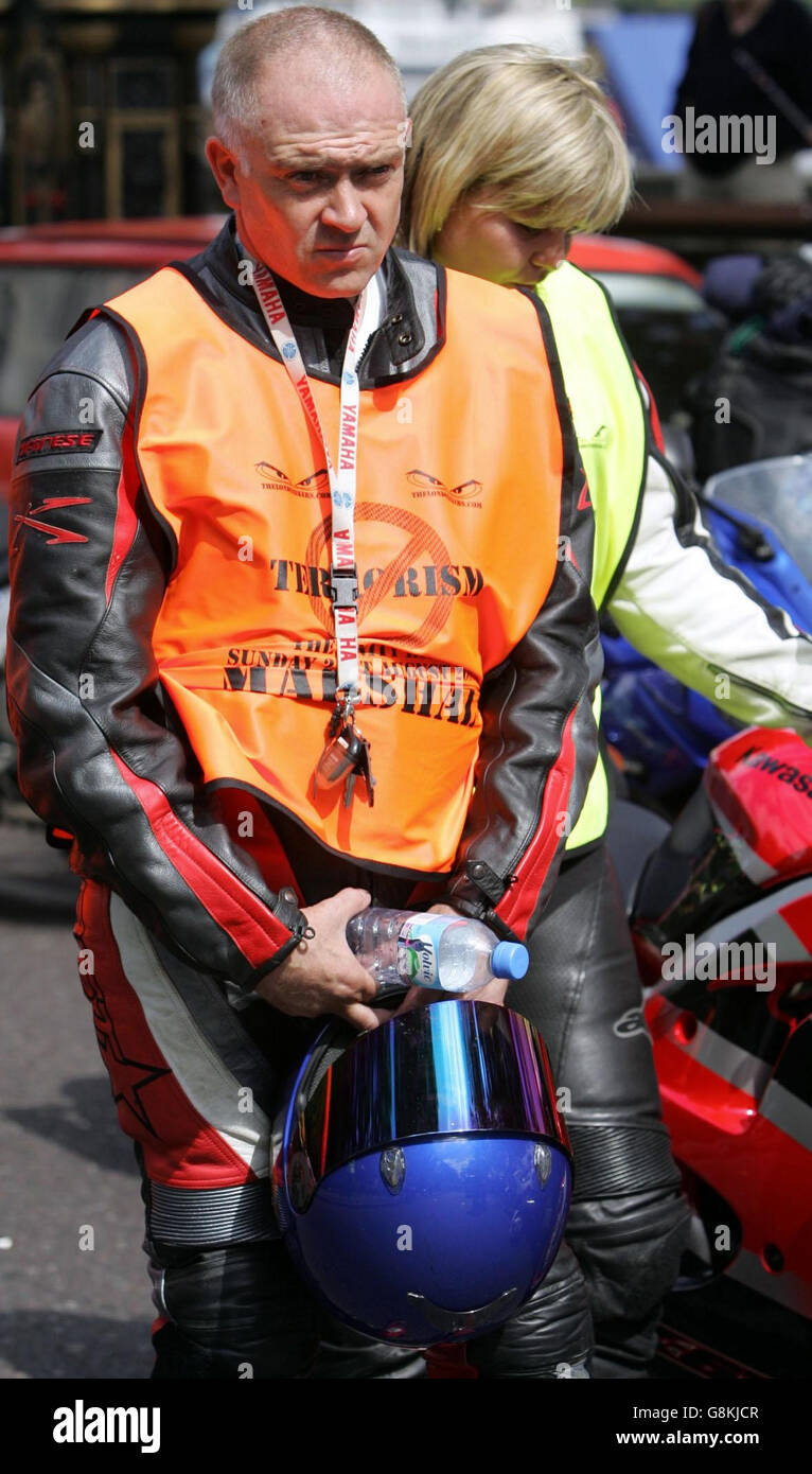 Bikers observe a minutes silence while taking part in the 'Unity Ride ...