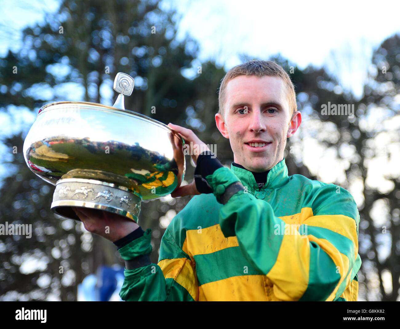 Jockey Mark Walsh celebrates with the trophy after winning the Irish ...