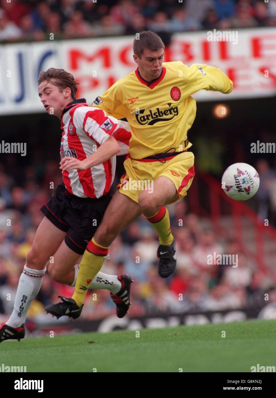 Michael Evans of Southampton (left) and Dominic Matteo of Liverpool ...
