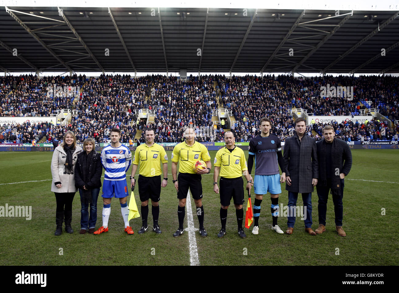 Officials Referee Stephen Martin and assistants Ronald Ganfield and ...