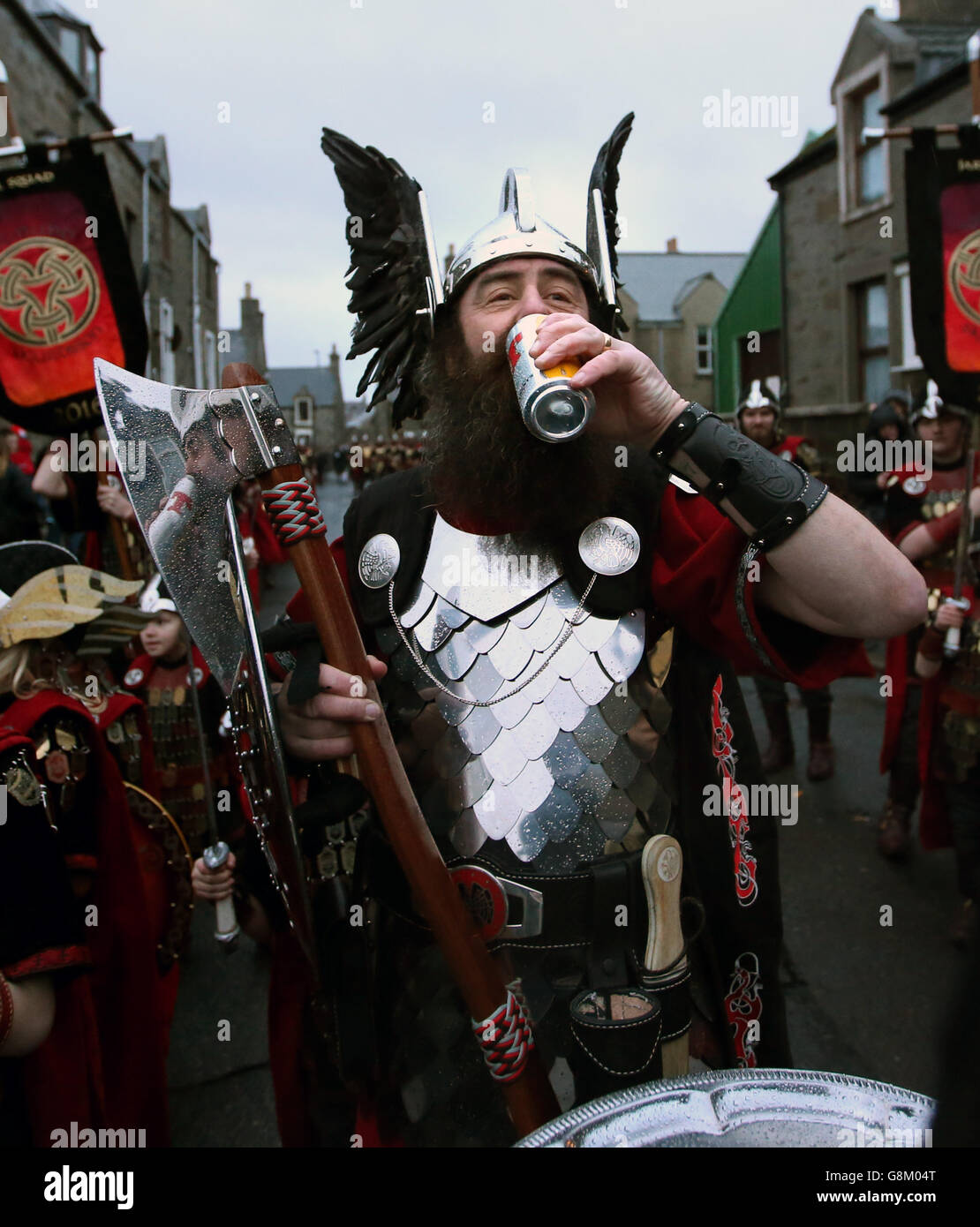 Guizer Jarl Mark Evans leads members of the Jarl Squad dressed in ...