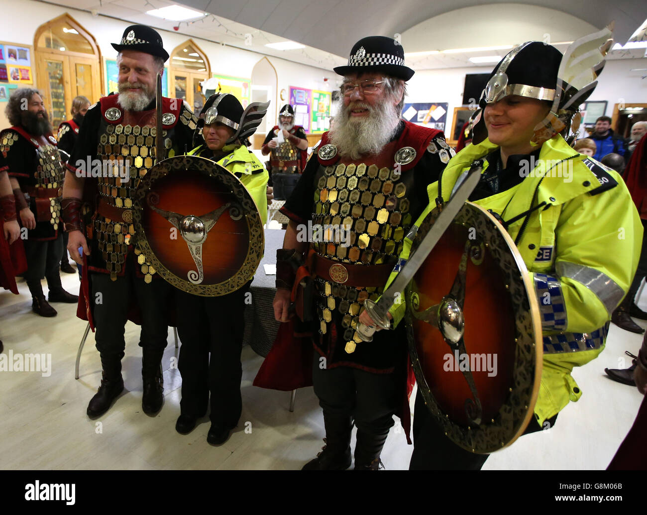 Police talk to members of the Jarl Squad dressed in Viking costumes at ...