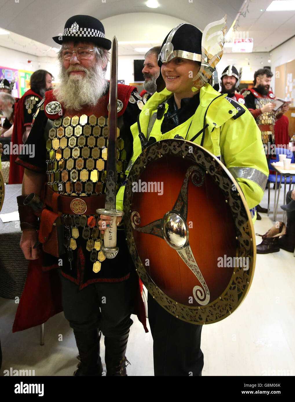 Police talk to members of the Jarl Squad dressed in Viking costumes at ...